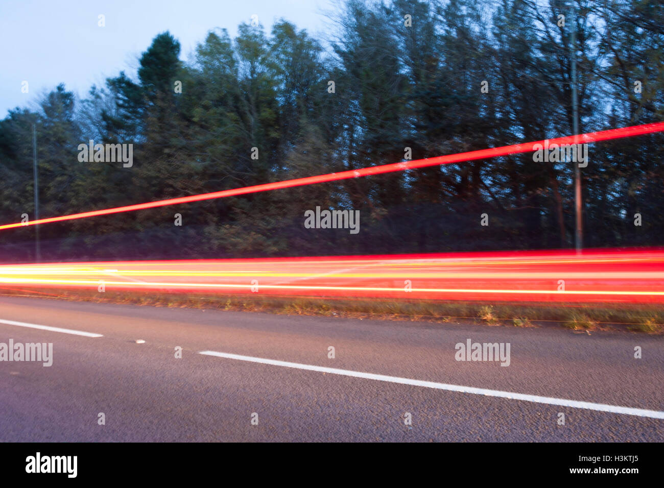 roadside light trails bright and surreal Stock Photo - Alamy