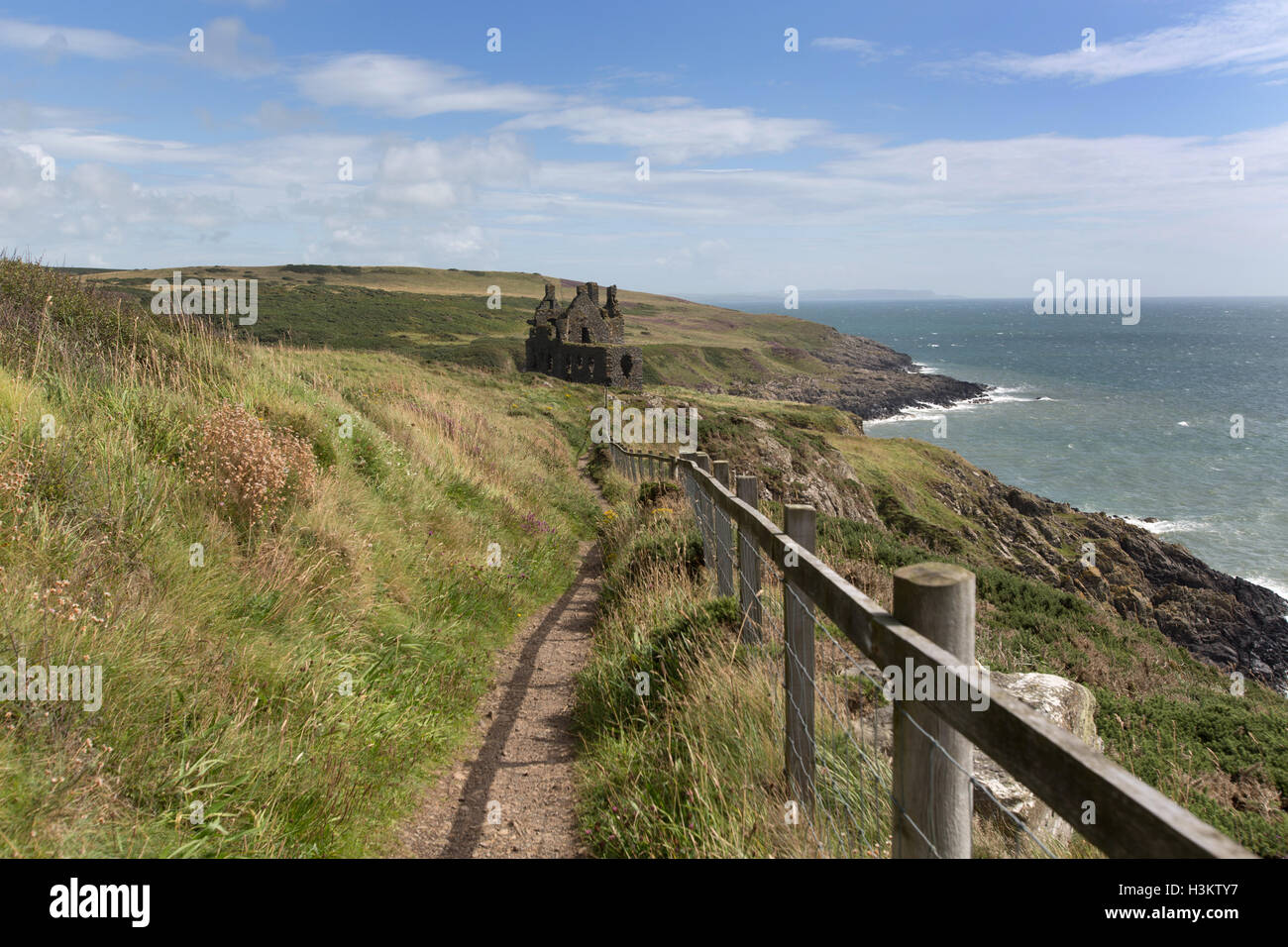 Portpatrick, Scotland. The historic Dunskey Castle ruins, which are ...