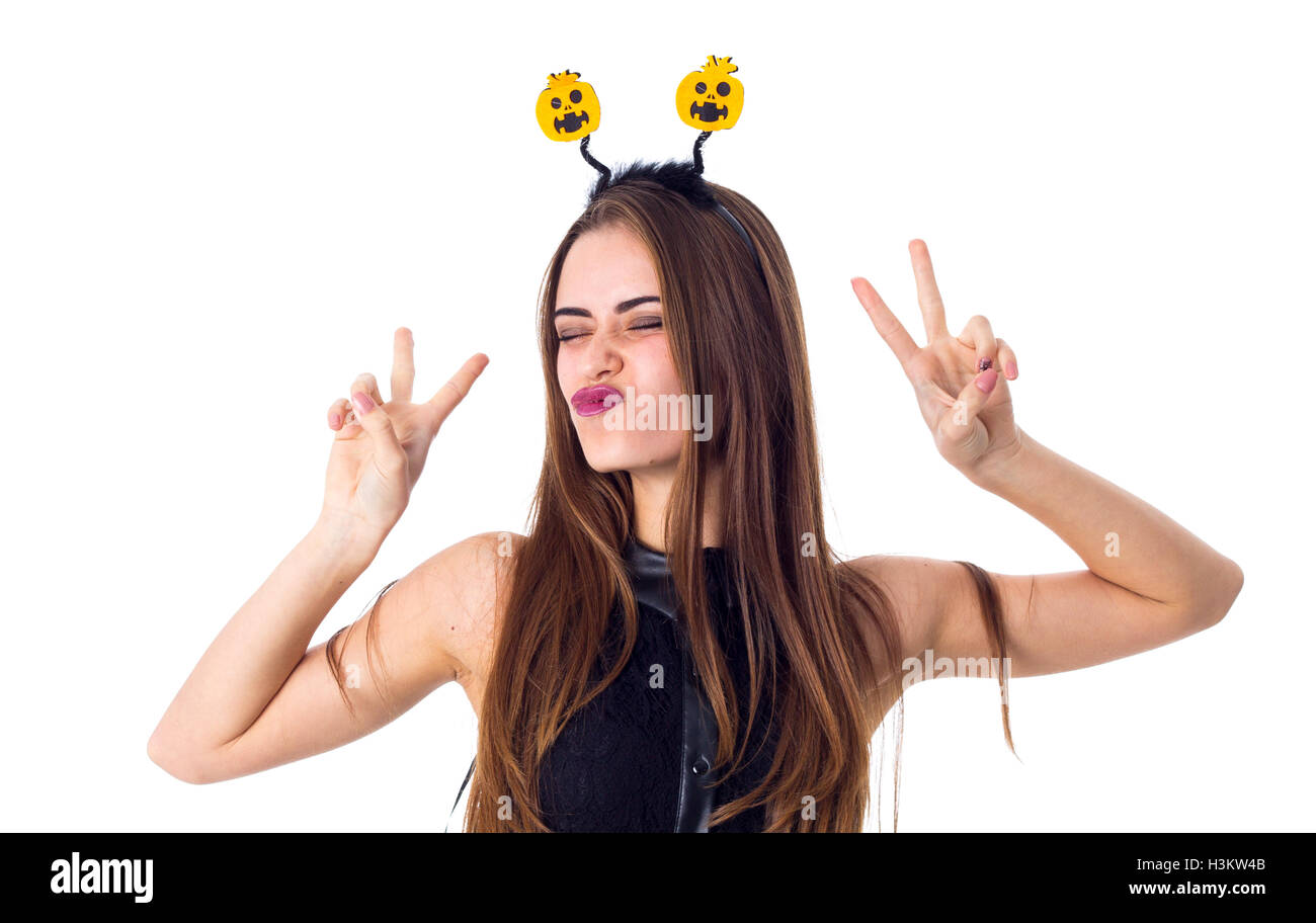 Woman with headband showing PEACE Stock Photo - Alamy