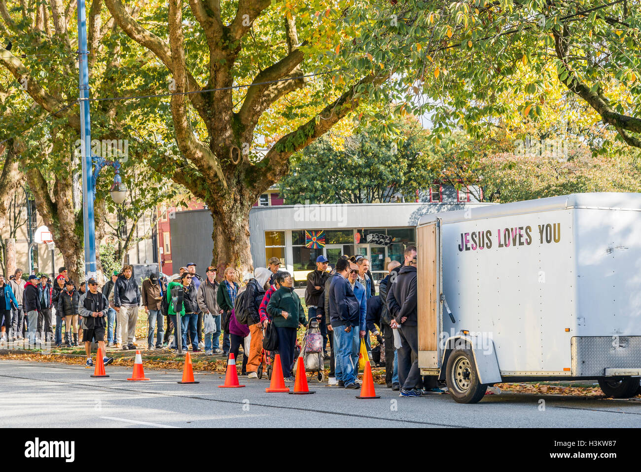 Free food line poor poverty jesus loves you hi-res stock photography ...