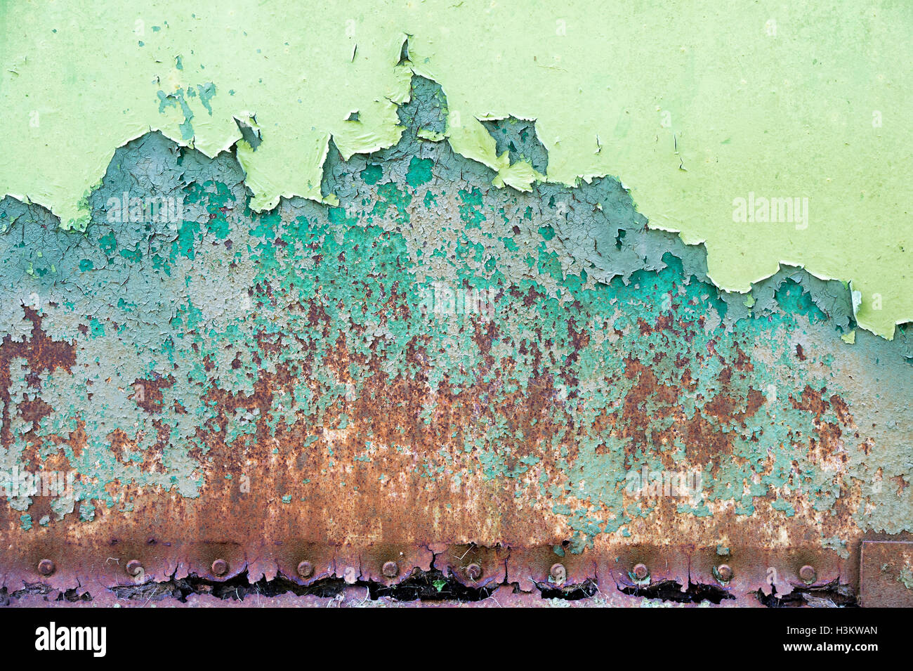 Peeling paint rust and rivets texture. Old metal garage door Stock ...