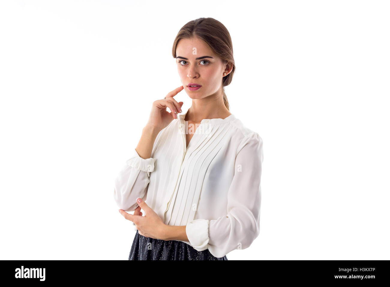 Woman holding hand near the face Stock Photo - Alamy