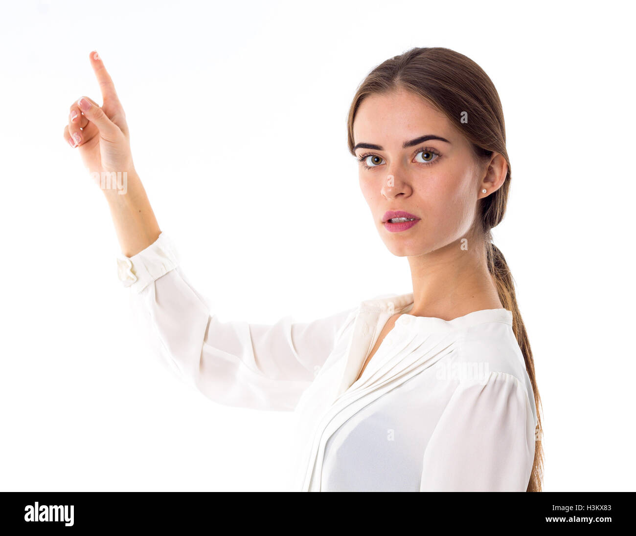 Woman pointing something out Stock Photo - Alamy
