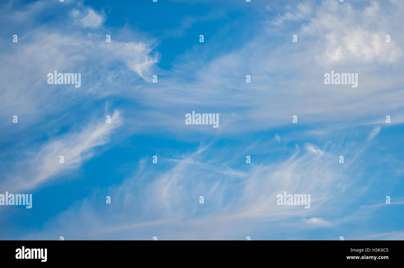 Blue boundless sky with the fluffy white clouds Stock Photo - Alamy