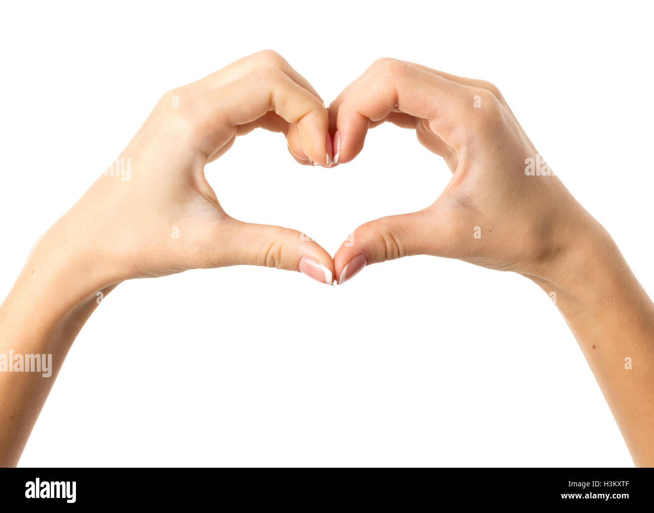 Woman's hands making heart Stock Photo - Alamy
