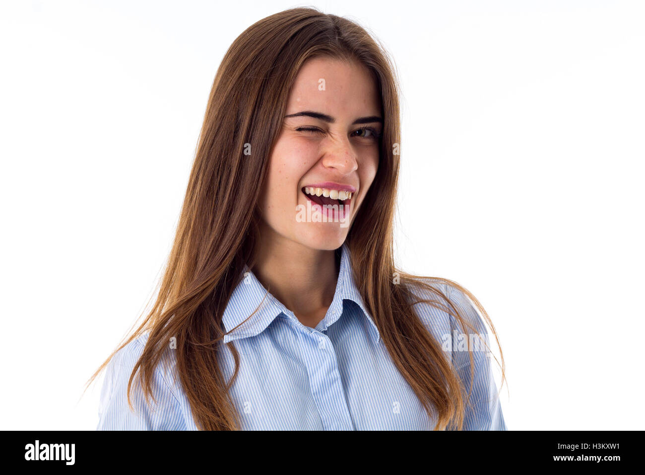 Smiling woman winking Stock Photo - Alamy