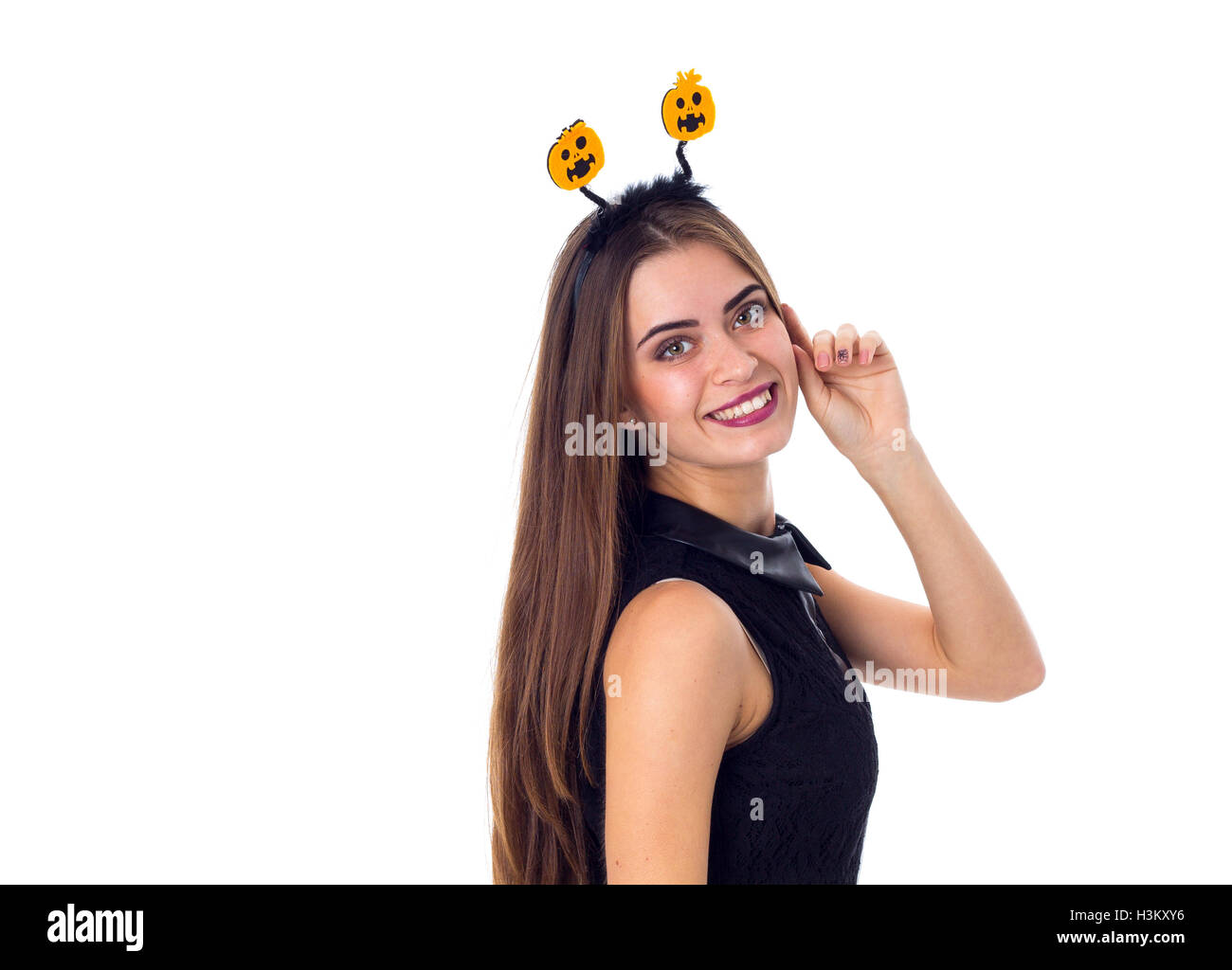 Woman with headband smiling Stock Photo - Alamy