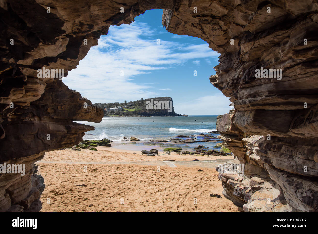 Avalon Beach Australia seen from within a shallow cliff cave in North ...