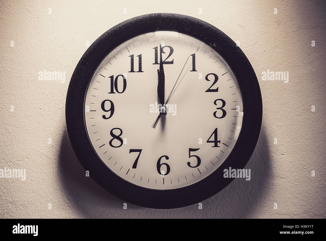 Details of a dusty clock on the white wall, retro style Stock Photo - Alamy