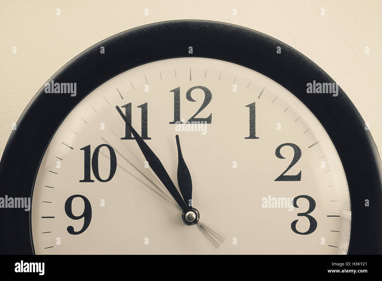Details of a dusty clock on the white wall, retro style Stock Photo - Alamy