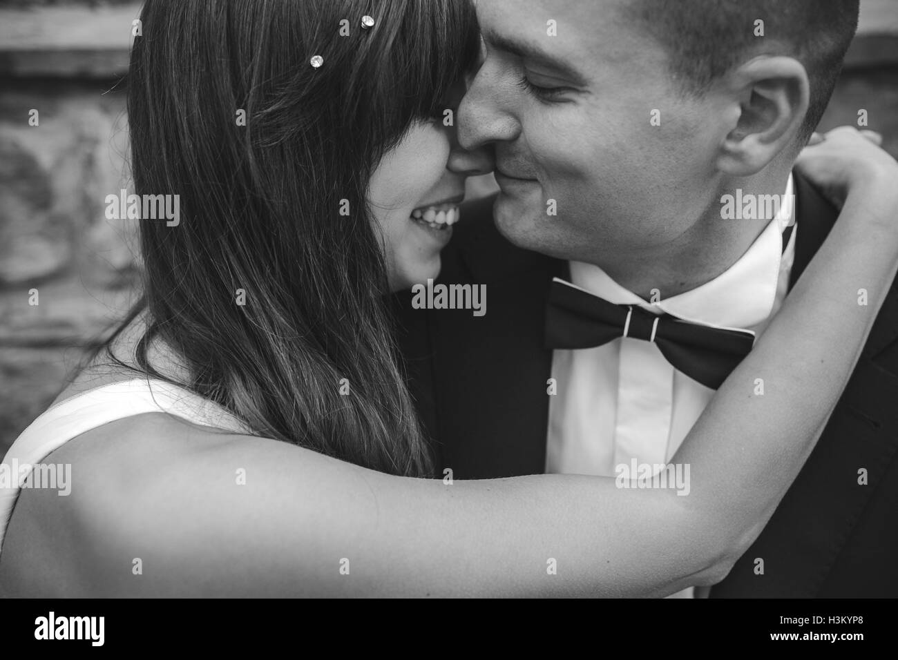 Bridal couple close to each other Stock Photo - Alamy