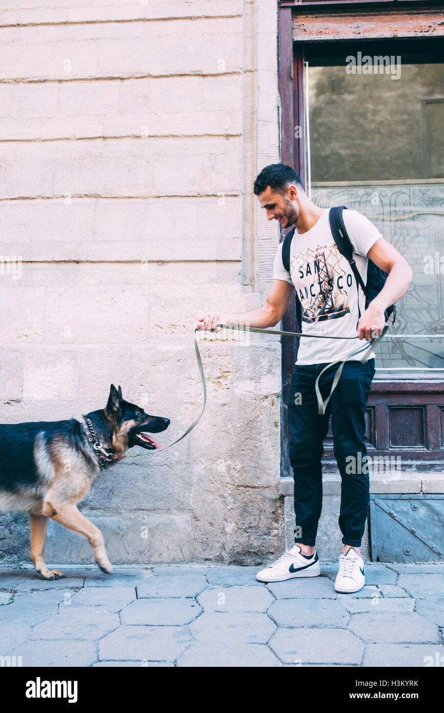 Man dog posing on street hi-res stock photography and images - Alamy