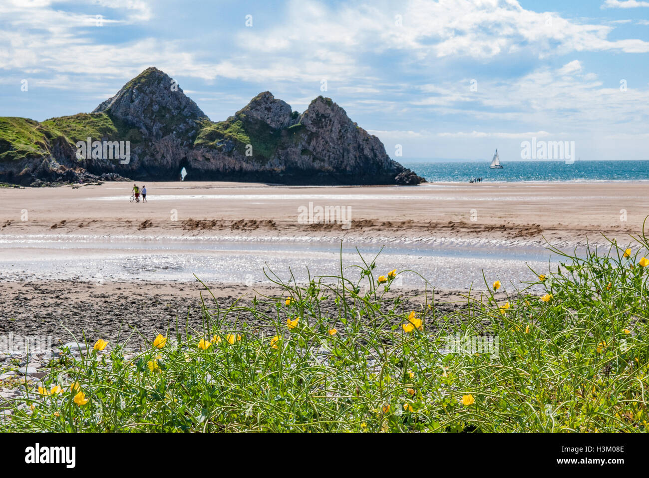 A view towards the beach at Three Cliffs Bay which is on The Gower ...