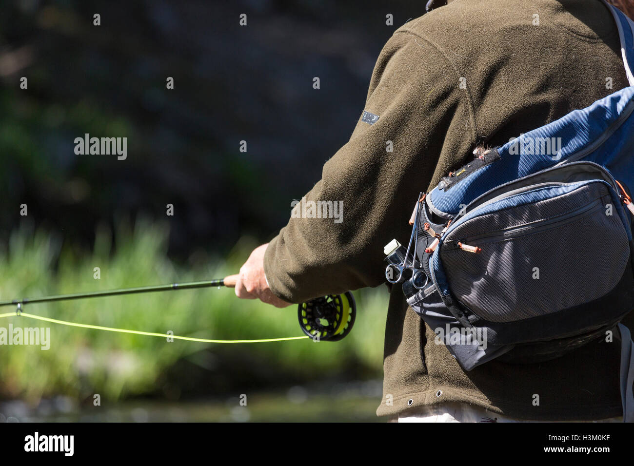 WY01041-00...WYOMING - Thomas Barry fly fishing the Brooks Lake Creek near Dubois Stock Photo ...