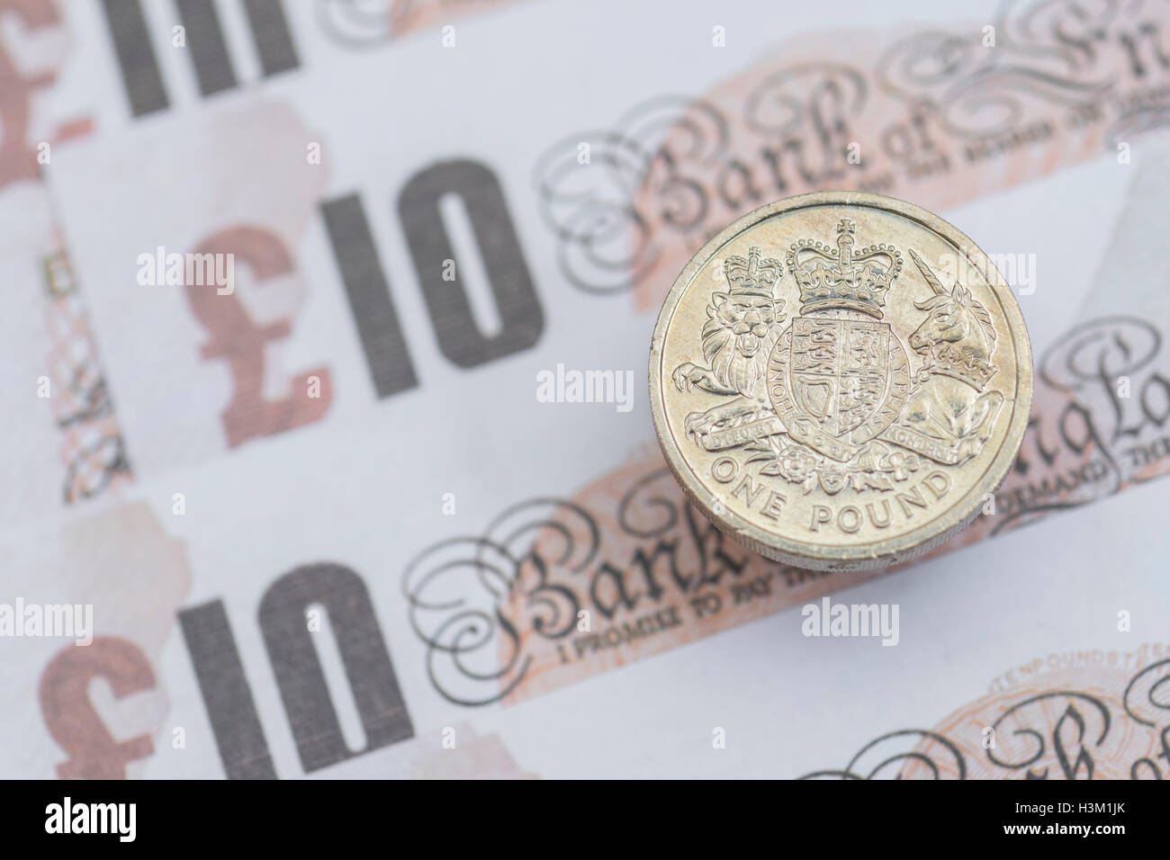 Sitting on pound coins hi-res stock photography and images - Alamy