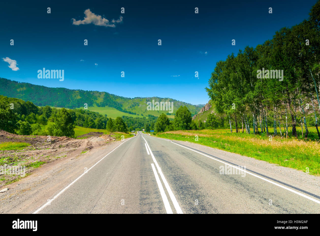 smooth automobile route passing in mountainous terrain Stock Photo - Alamy