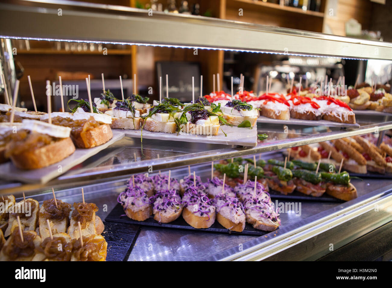 Tapas on display in a bar in the old quarter of Valencia Stock Photo ...