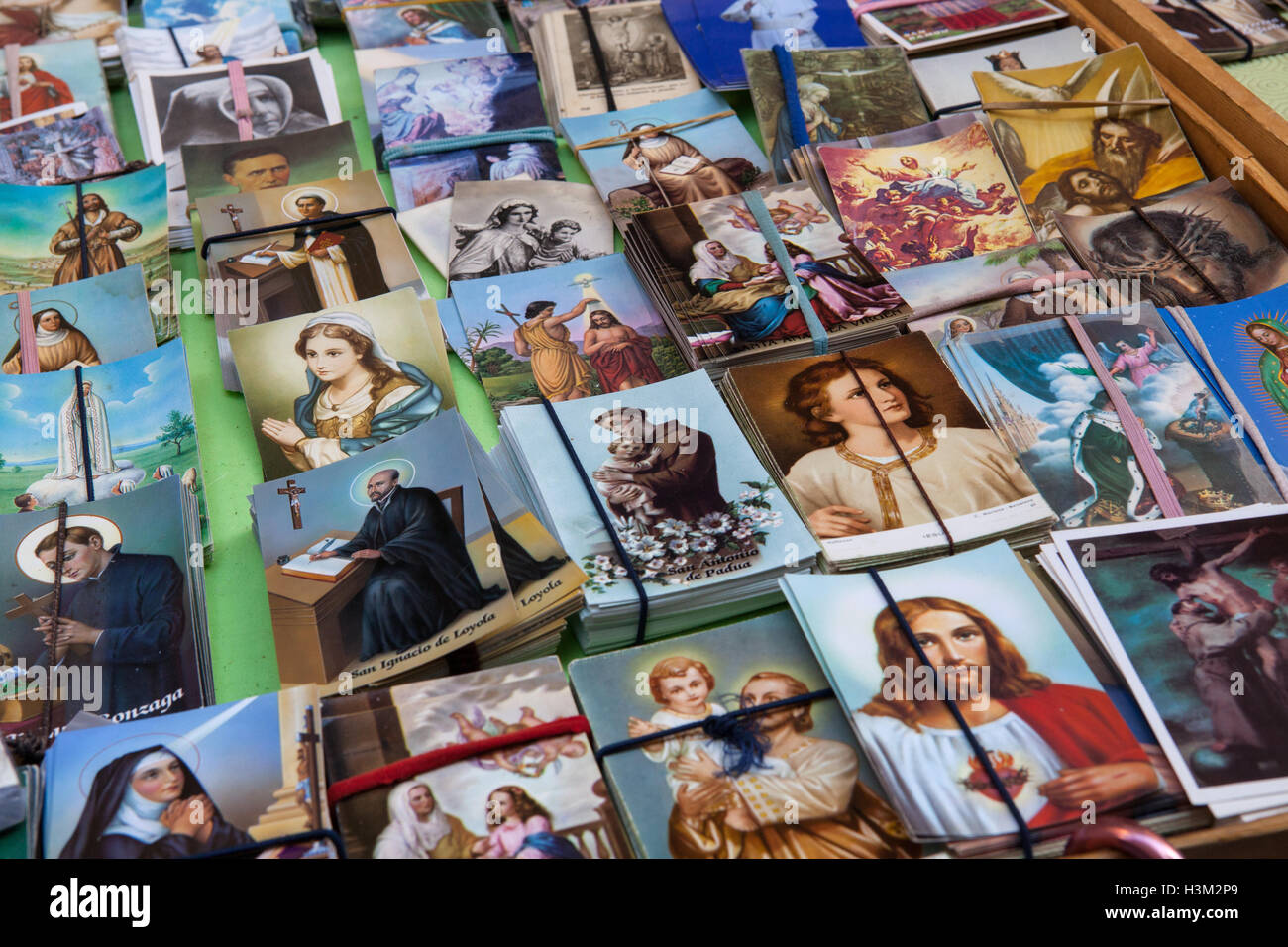 Display of religious prayer cards for sale in the old quarter of ...