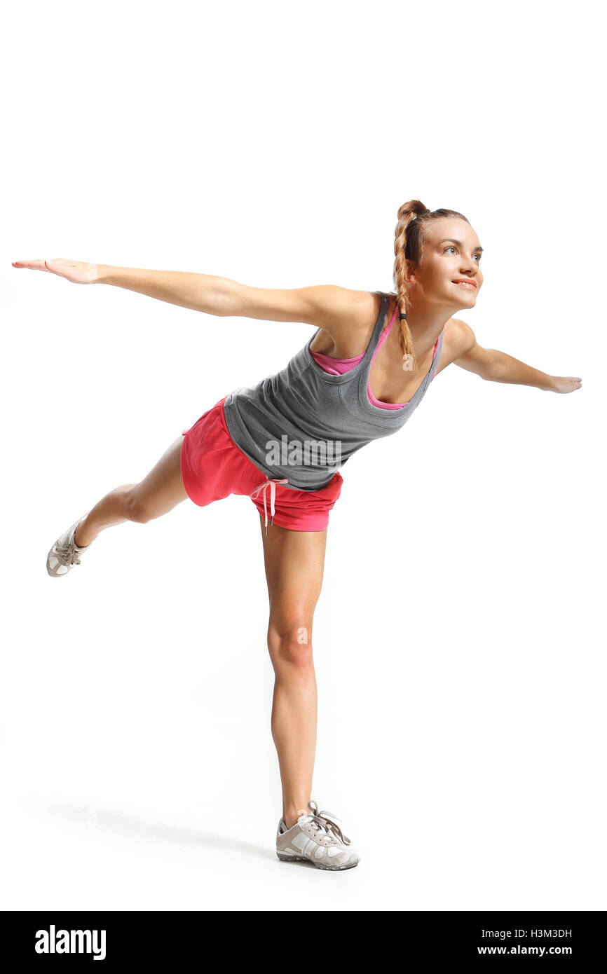 Woman practicing balance Stock Photo - Alamy