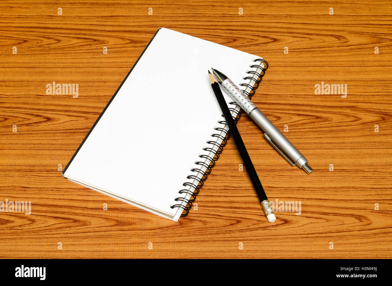 notebook pen and pencil Stock Photo - Alamy