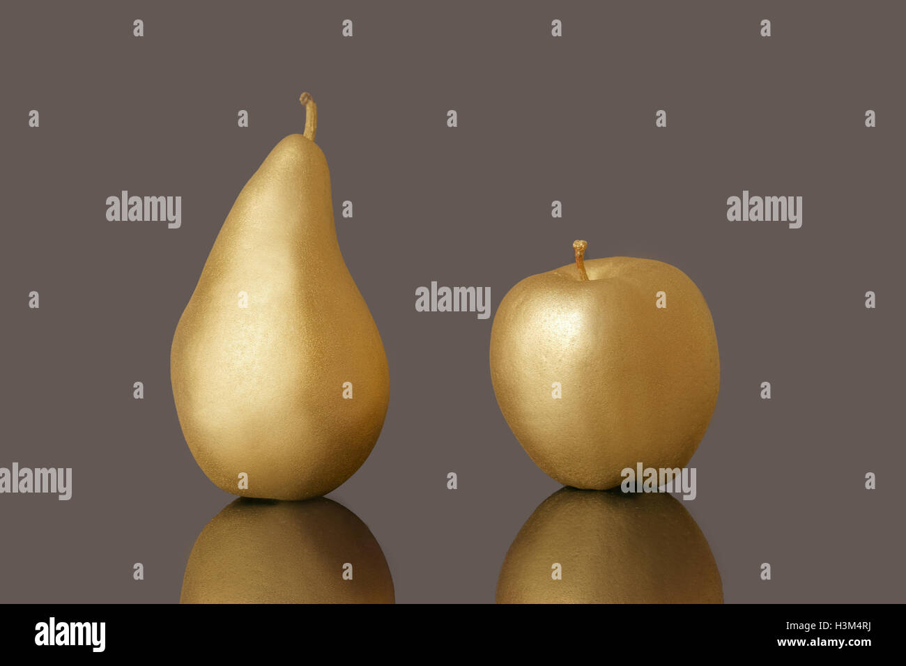 Golden pear and apple Stock Photo - Alamy