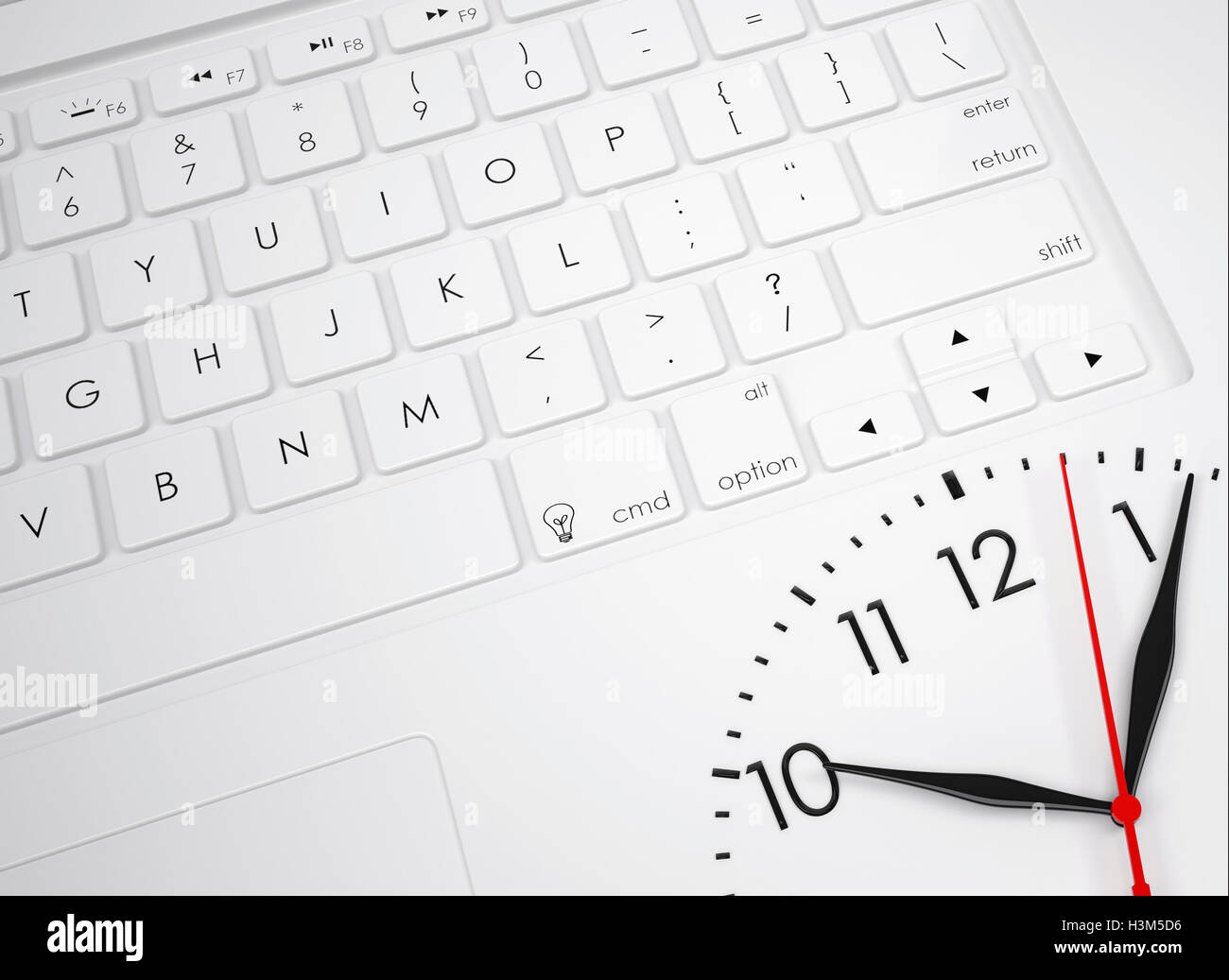 Clock face on the keyboard Stock Photo - Alamy