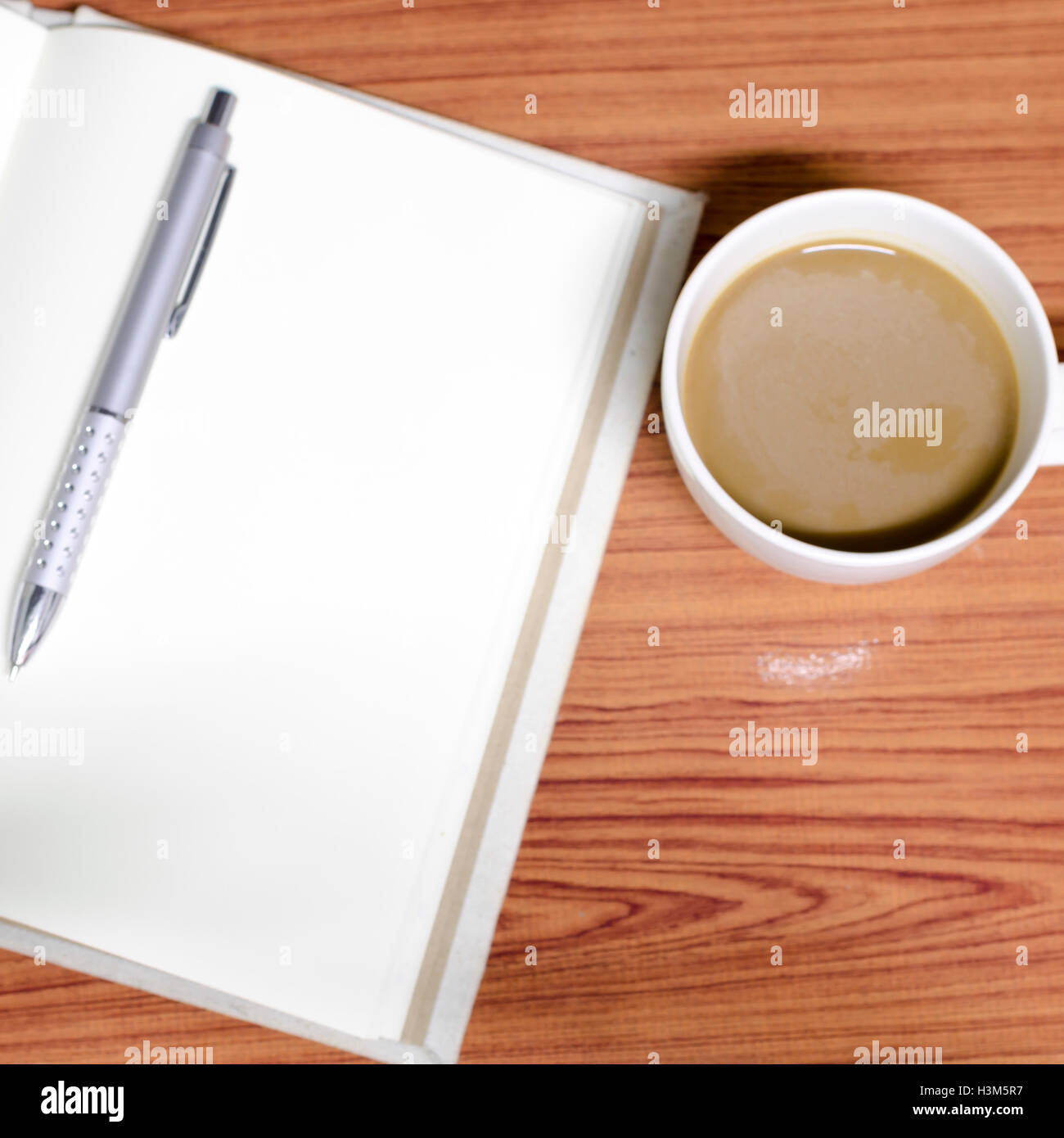 coffee and notebook Stock Photo - Alamy