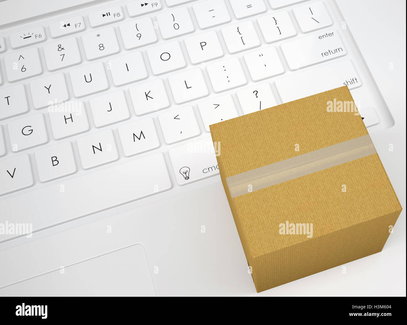 Closed cardboard box on the keyboard Stock Photo - Alamy