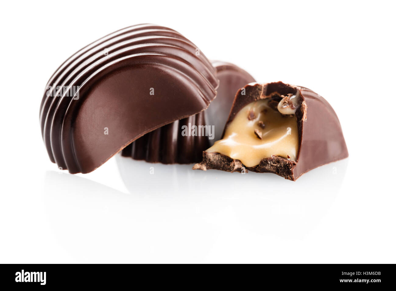 sweets, chocolate candies closeup on a white background Stock Photo - Alamy