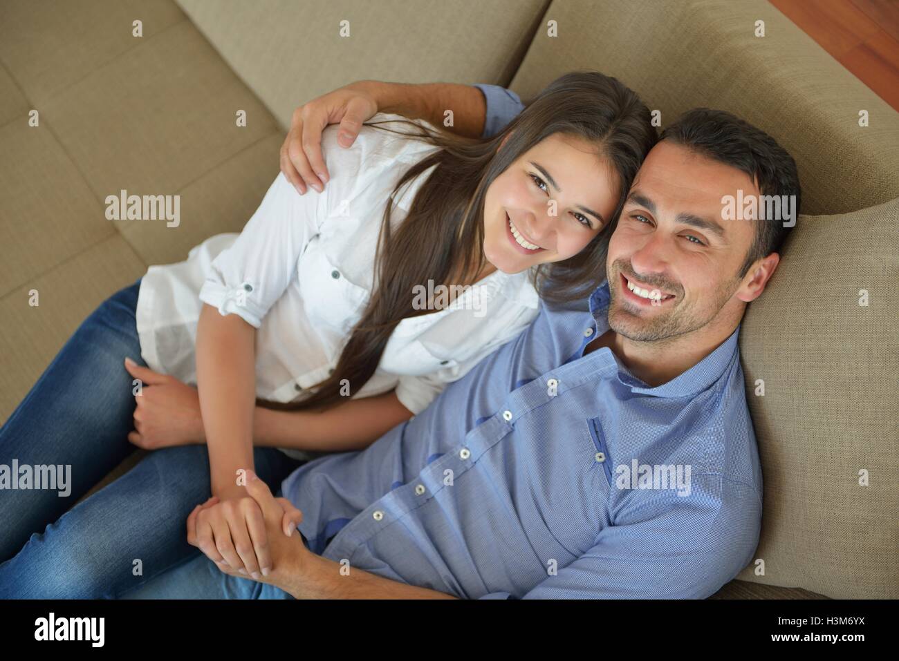 young couple relax at home Stock Photo - Alamy