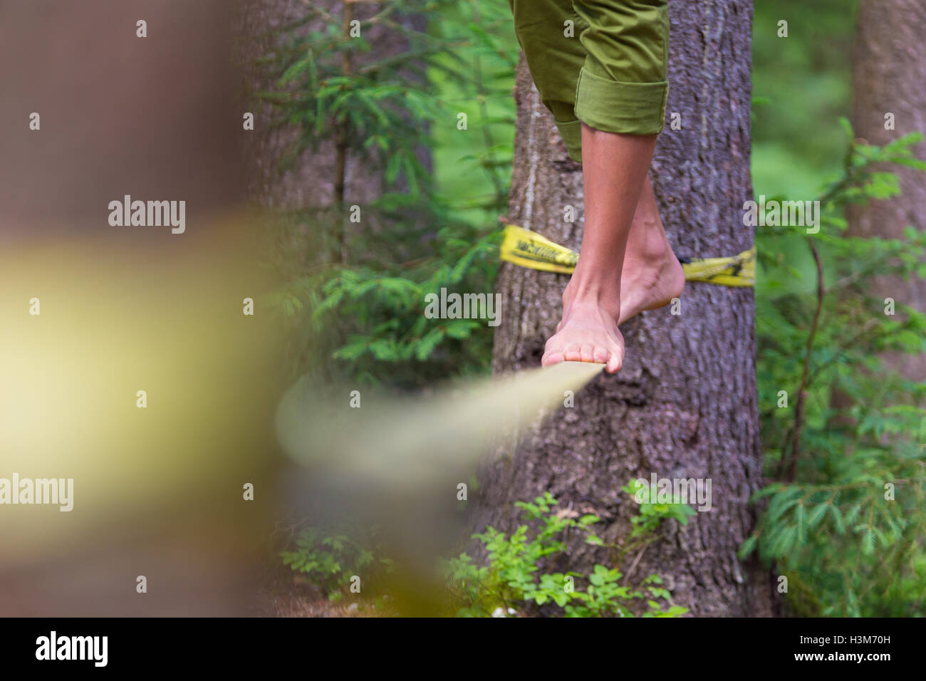 Slack line in the nature Stock Photo - Alamy