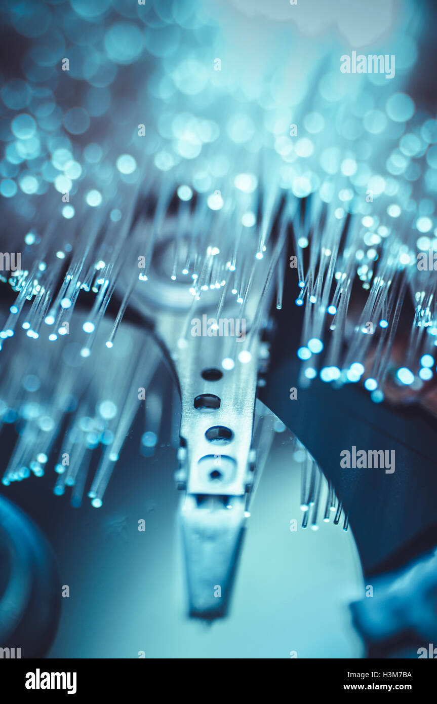 computer, mechanism inside hard disk with fiber optic lights Stock ...