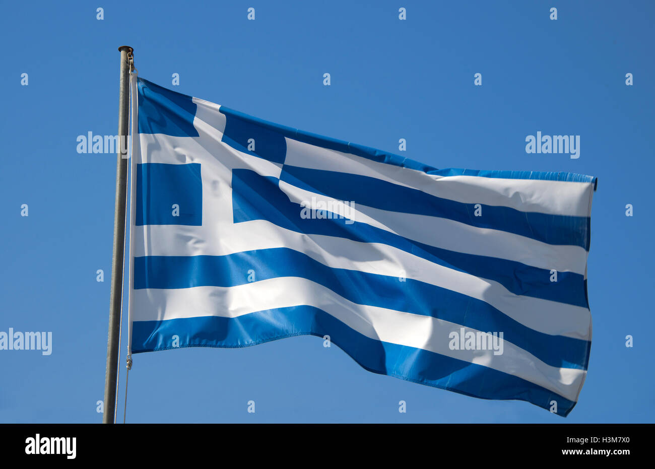 Flag of greece flying hi-res stock photography and images - Alamy