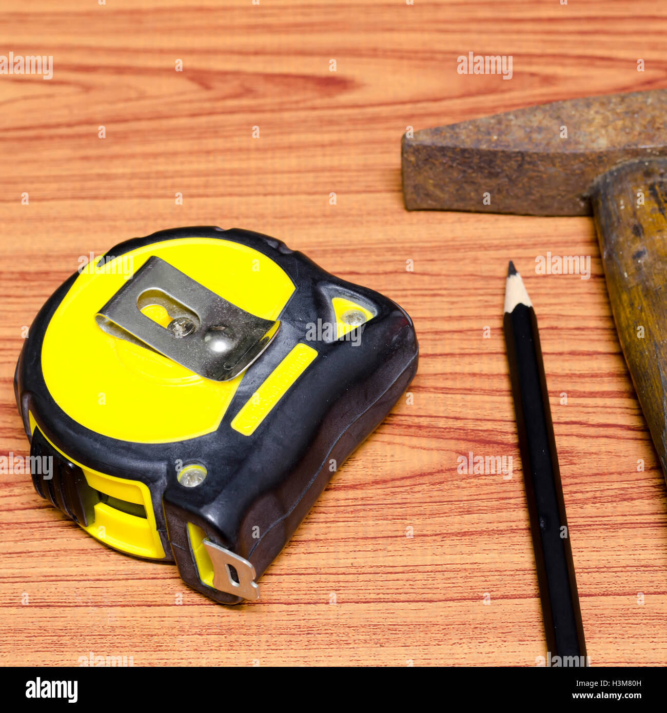 hammer measuring tape and pencil Stock Photo - Alamy