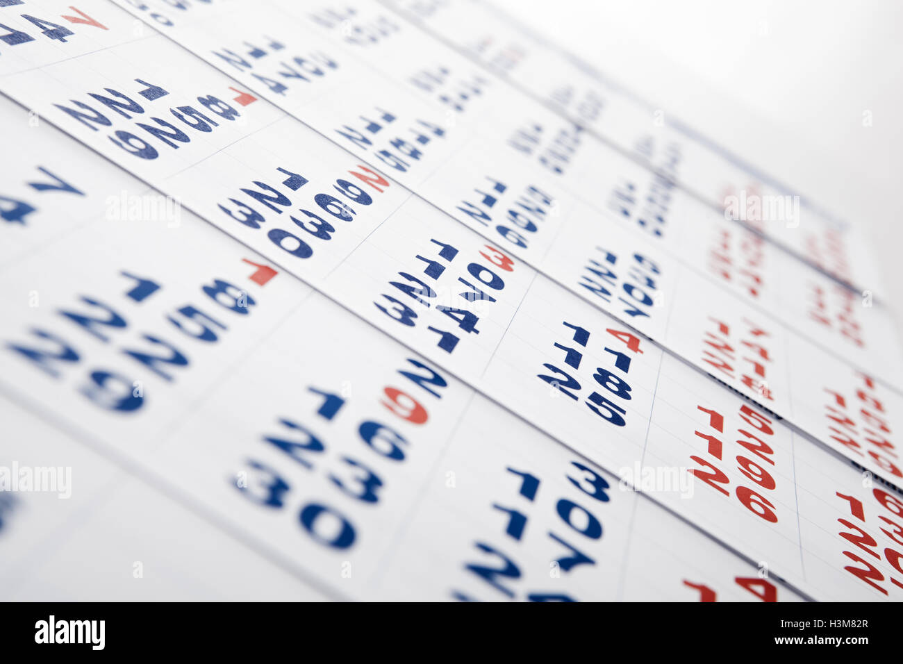 sheets of wall calendar with the number of days Stock Photo - Alamy