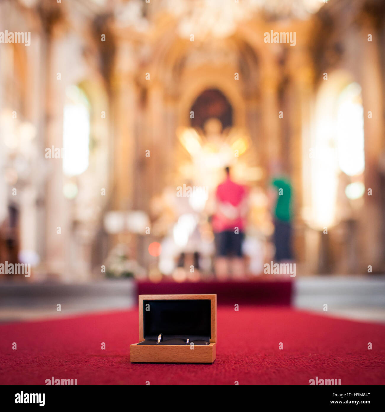 Wedding rings in church Stock Photo - Alamy