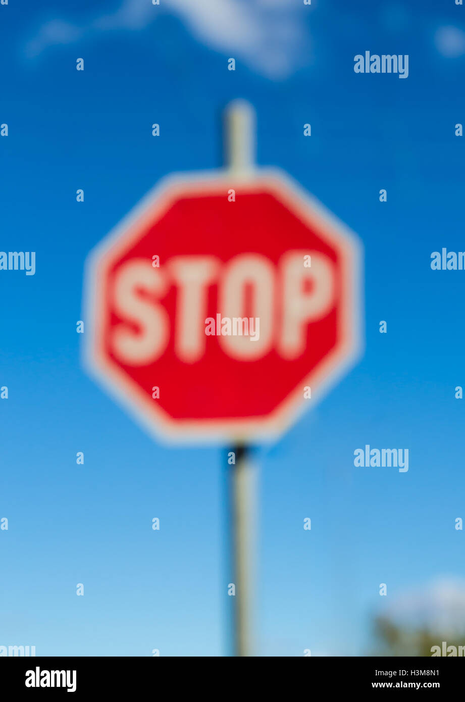 Out of focus photo of Stop sign Stock Photo - Alamy