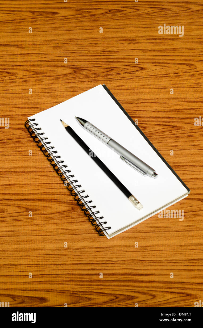 notebook pen and pencil Stock Photo - Alamy