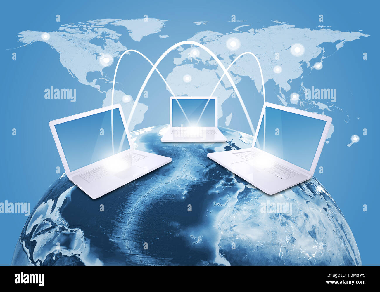 Laptops with Earth and world map Stock Photo - Alamy