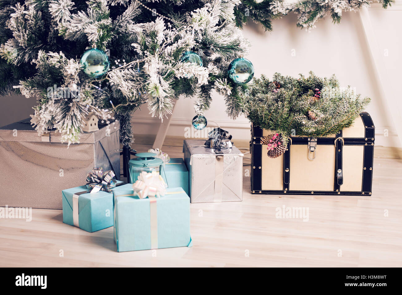 Christmas tree with gift boxes Stock Photo - Alamy