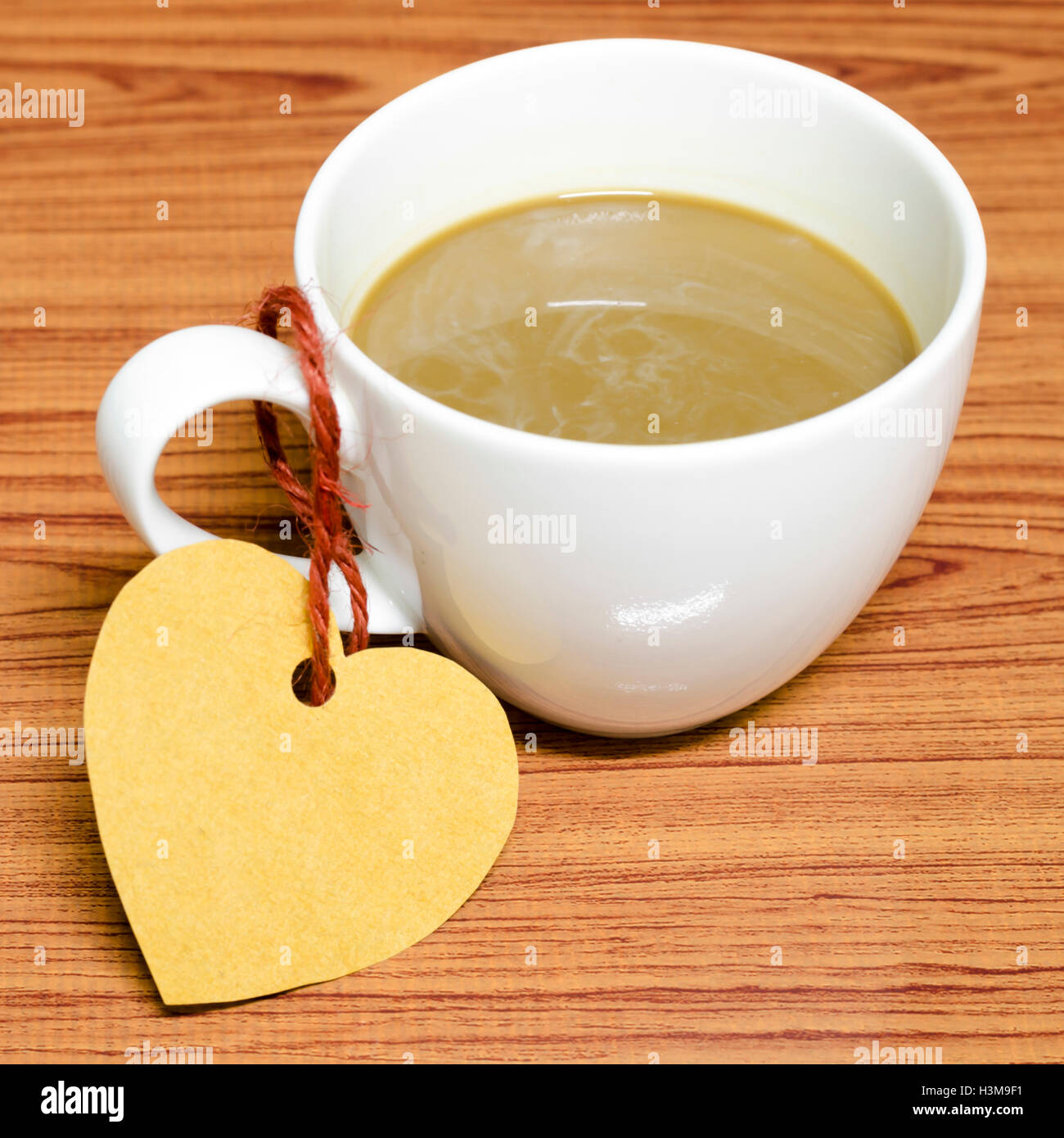 coffee cup with heart tag Stock Photo - Alamy