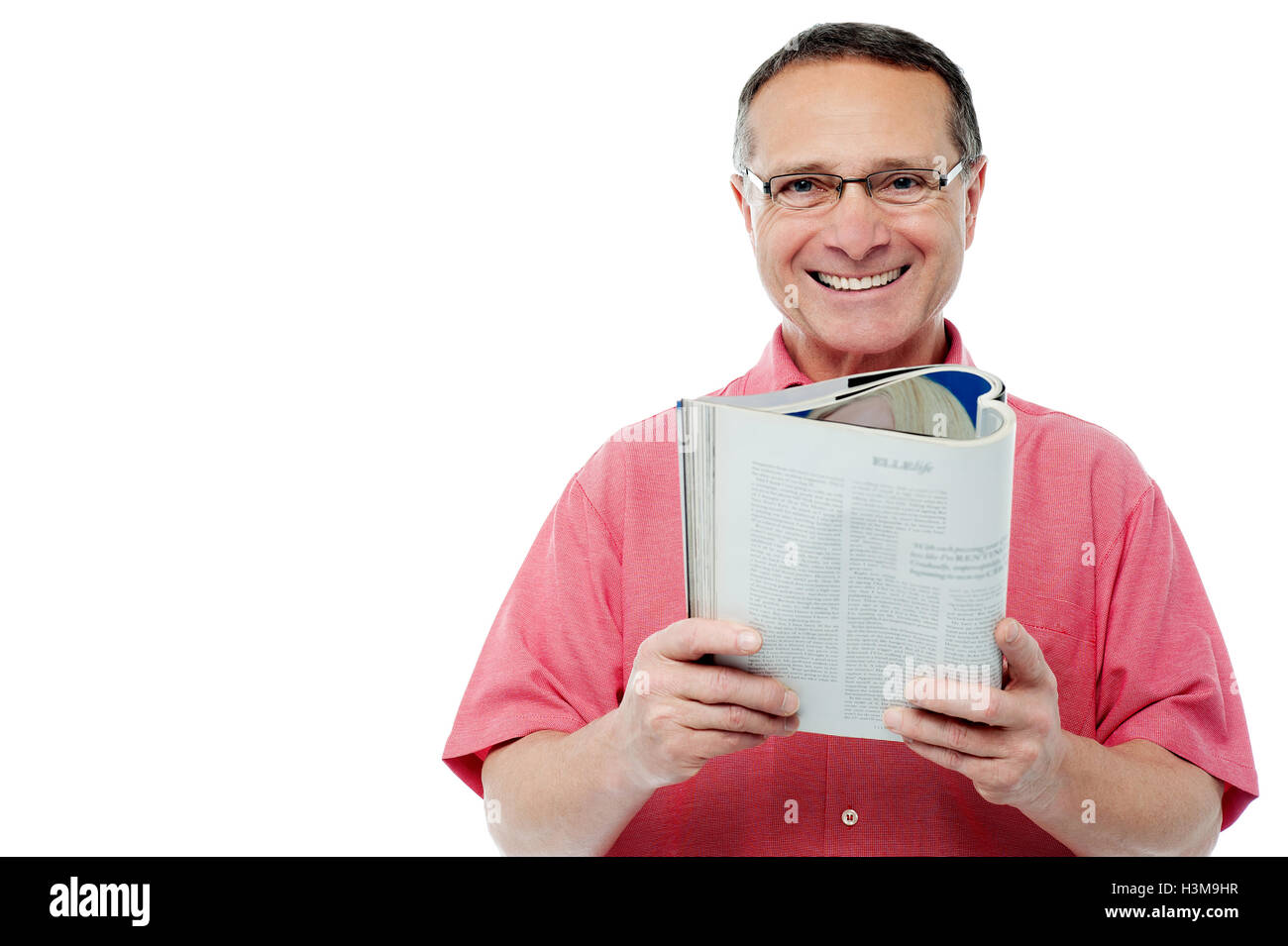 Handsome man reading book Stock Photo - Alamy