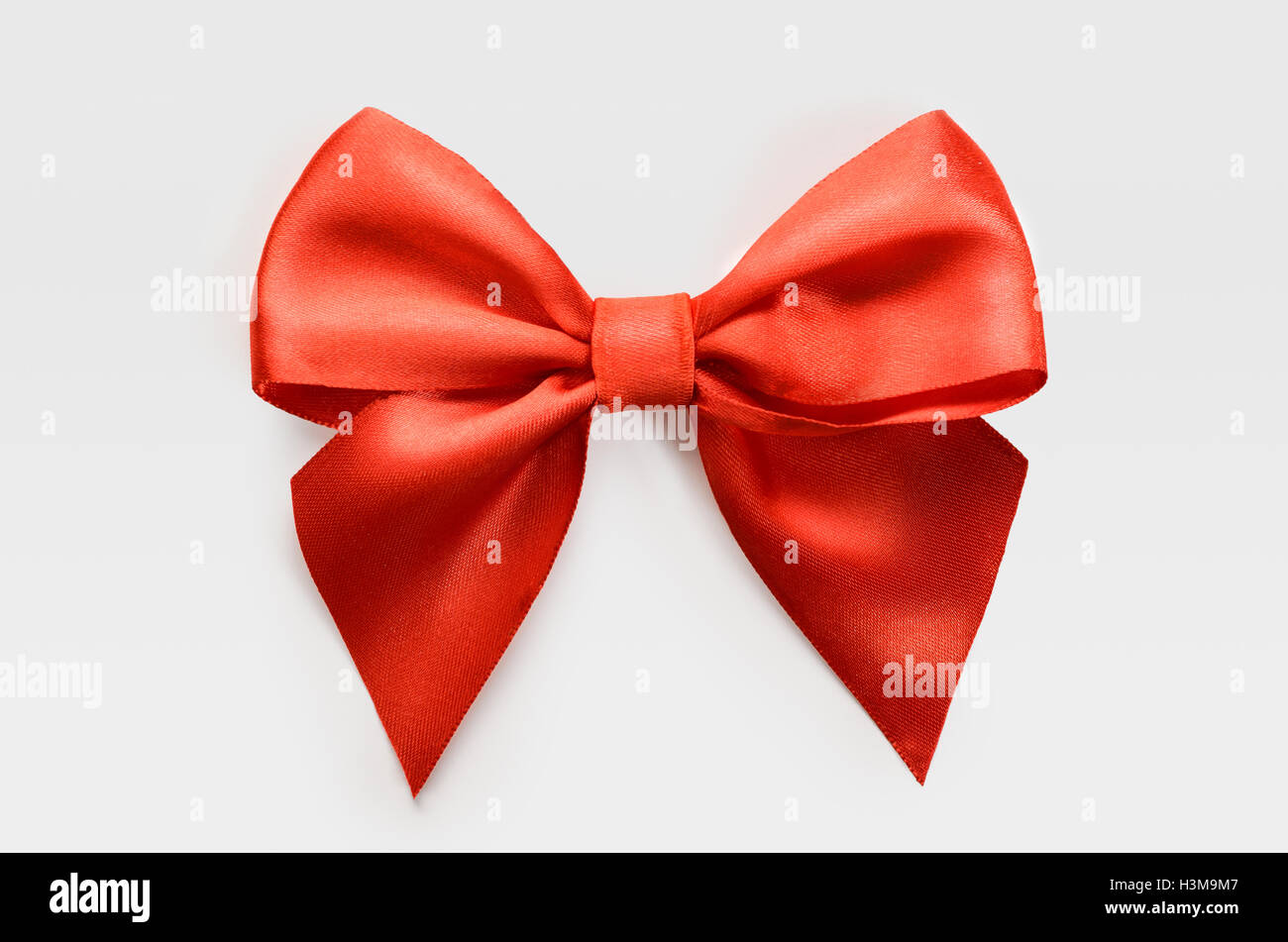 red satin bow Stock Photo - Alamy