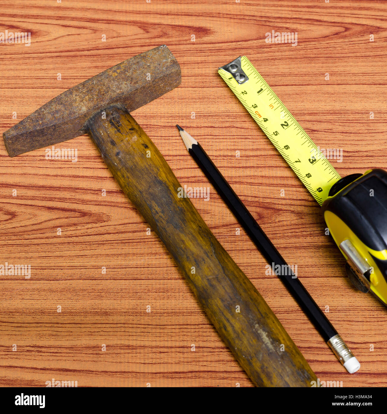 hammer measuring tape and pencil Stock Photo - Alamy