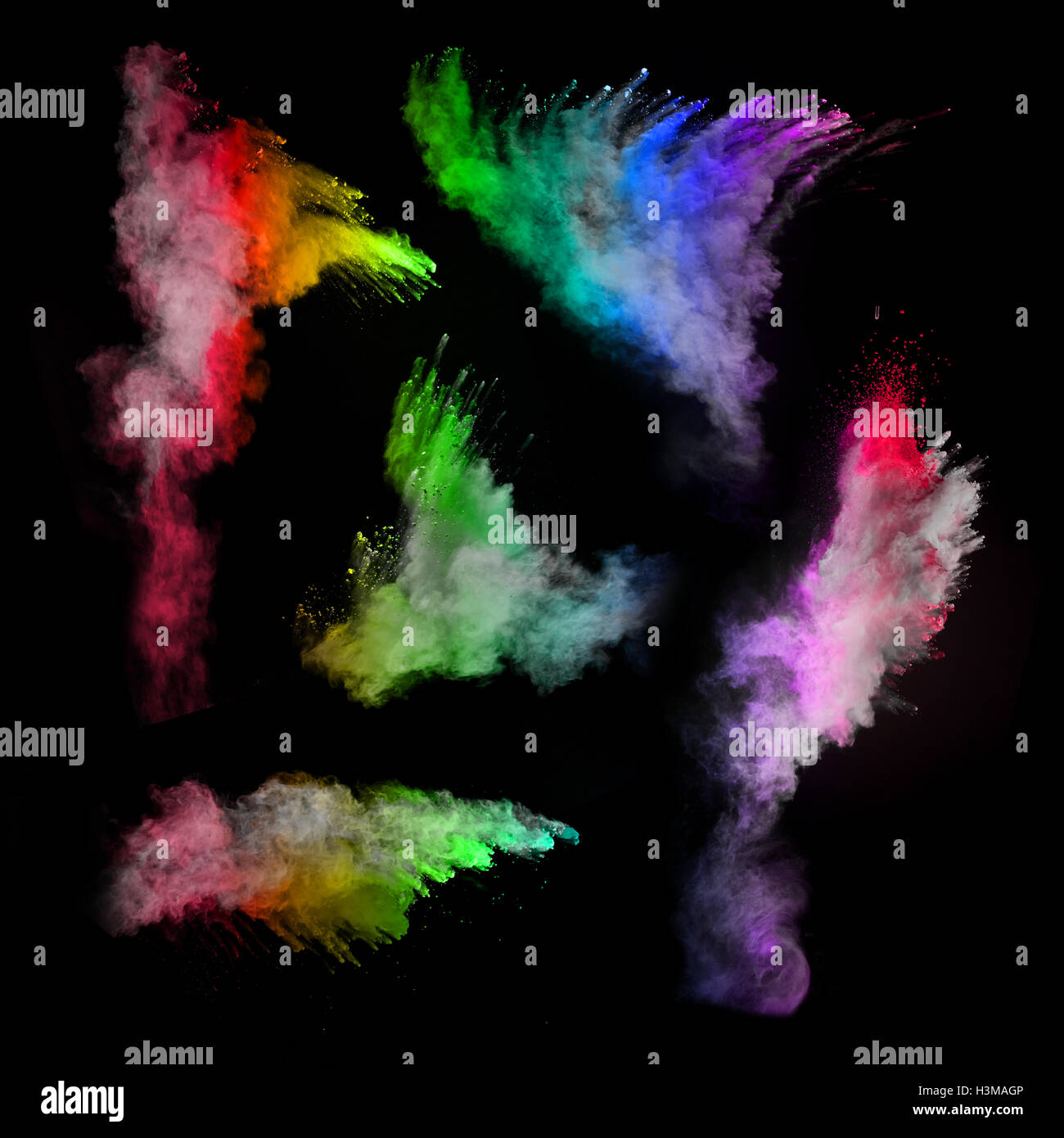 Explosion of colored powders, isolated on black background Stock Photo ...