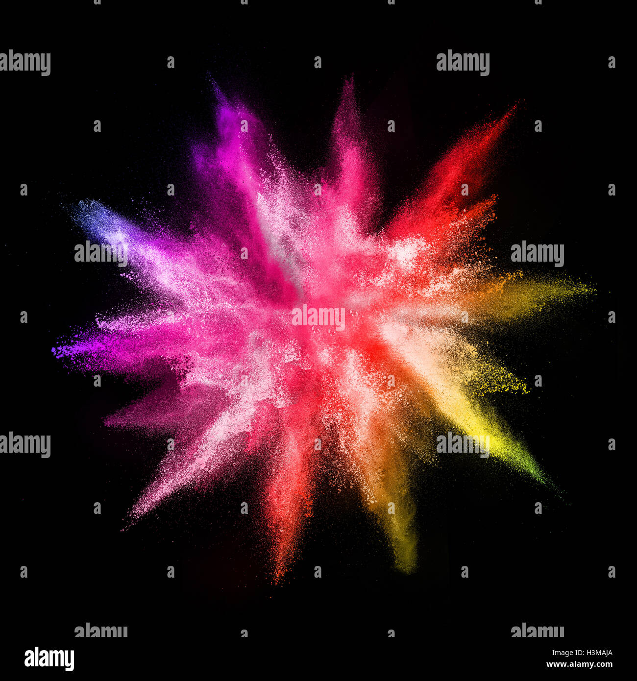 Explosion of colored powder, isolated on black background Stock Photo ...