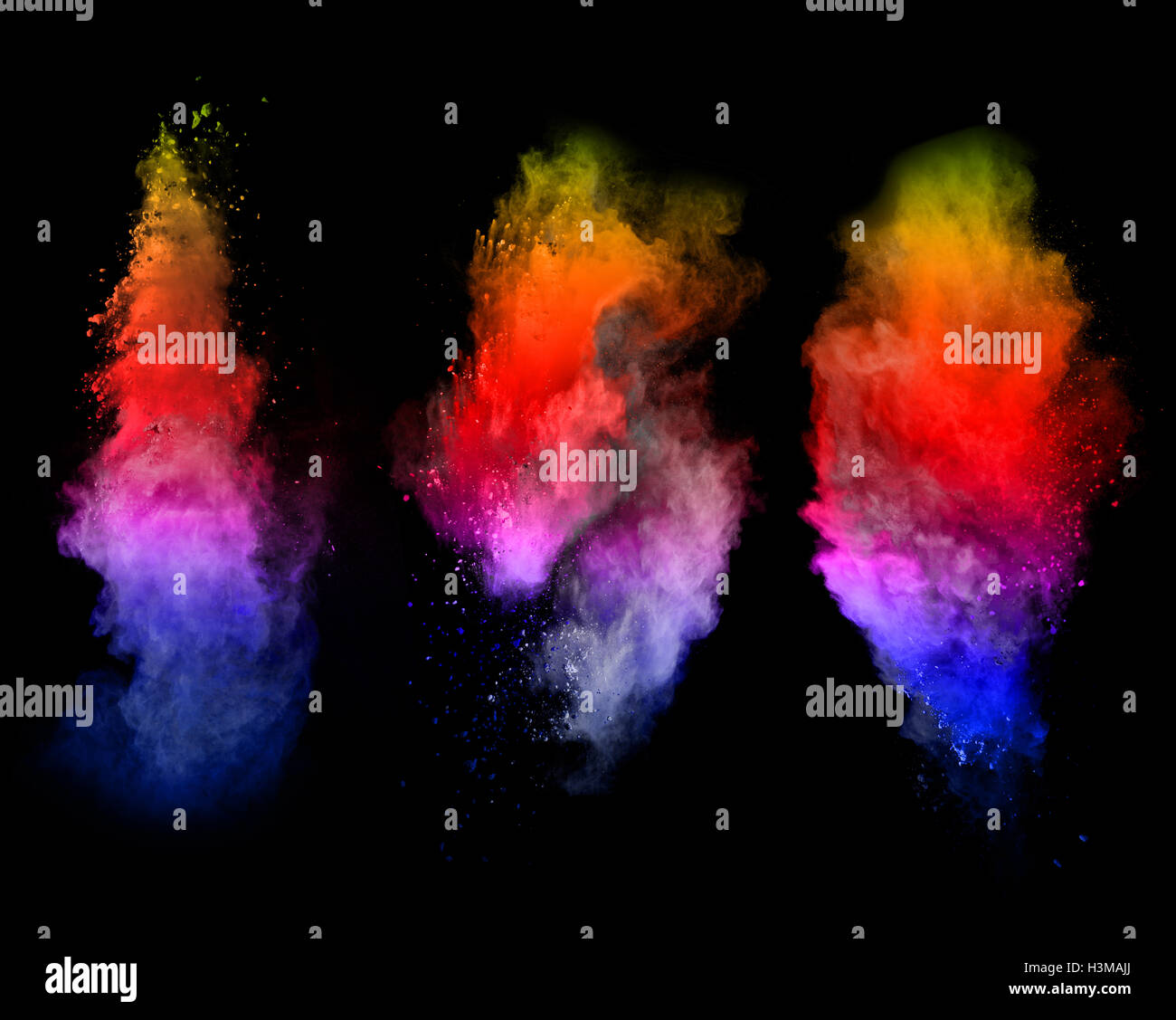 Explosion of colored powders, isolated on black background Stock Photo ...