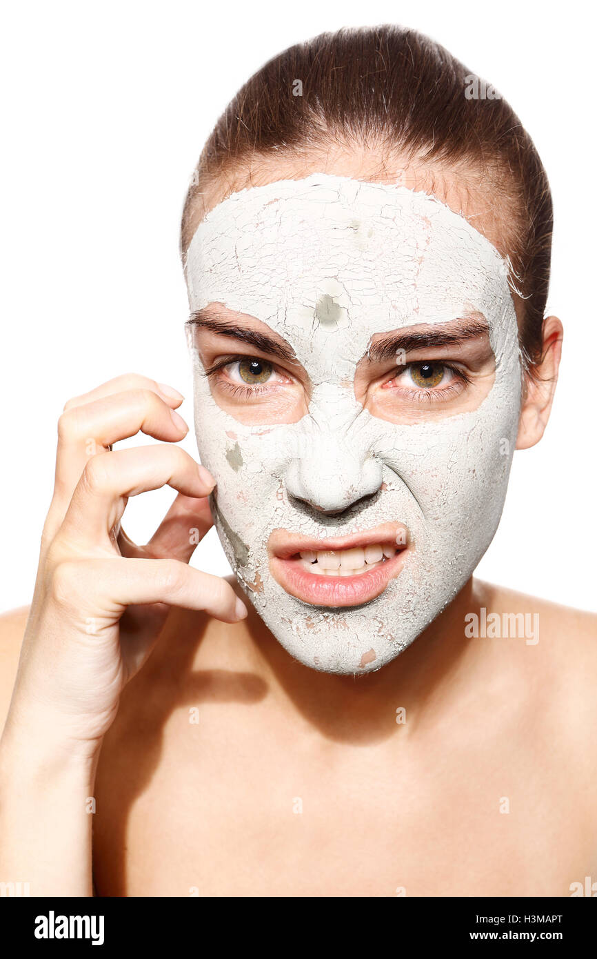 evil woman in the mask with green clay Stock Photo - Alamy