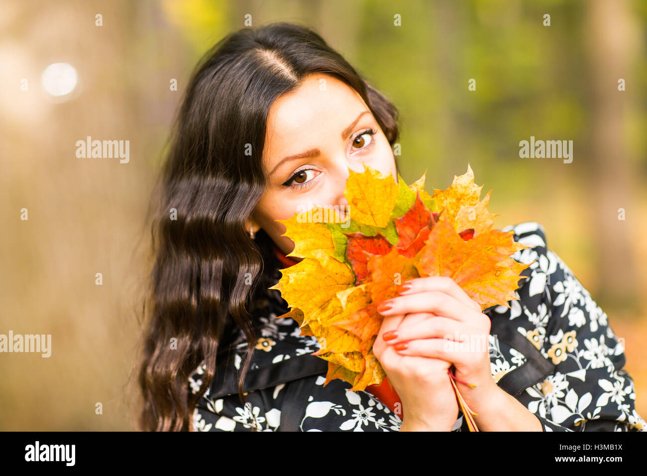 Beautiful young brunette woman - colorful autumn portrait Stock Photo ...