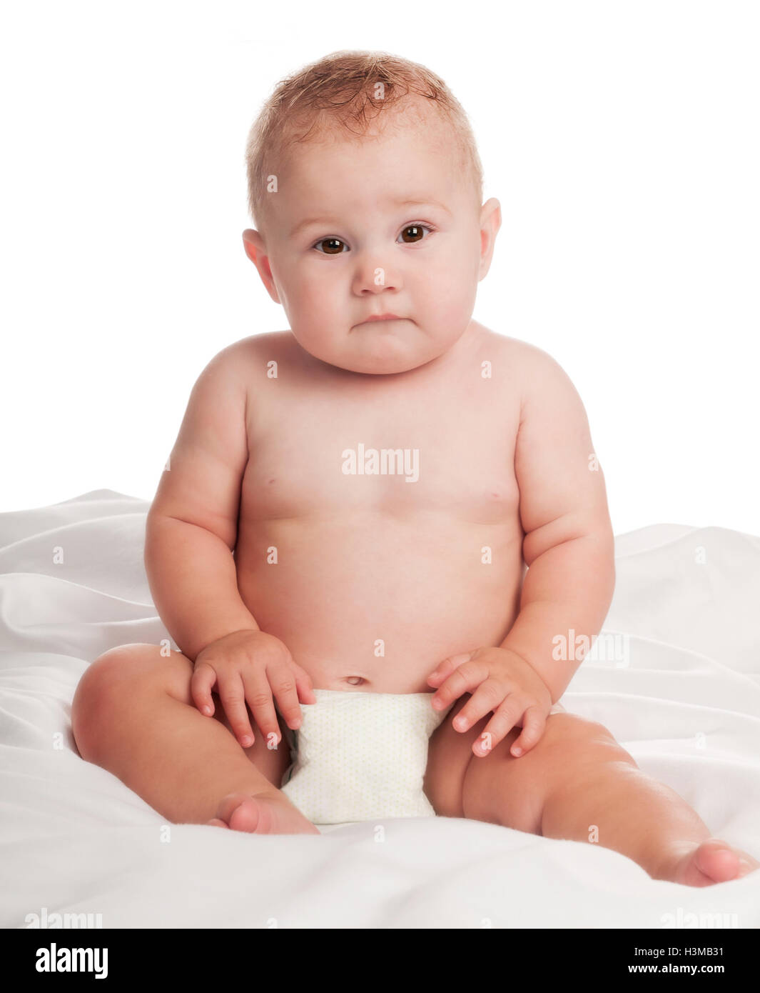 Beautiful baby in a diaper Stock Photo - Alamy